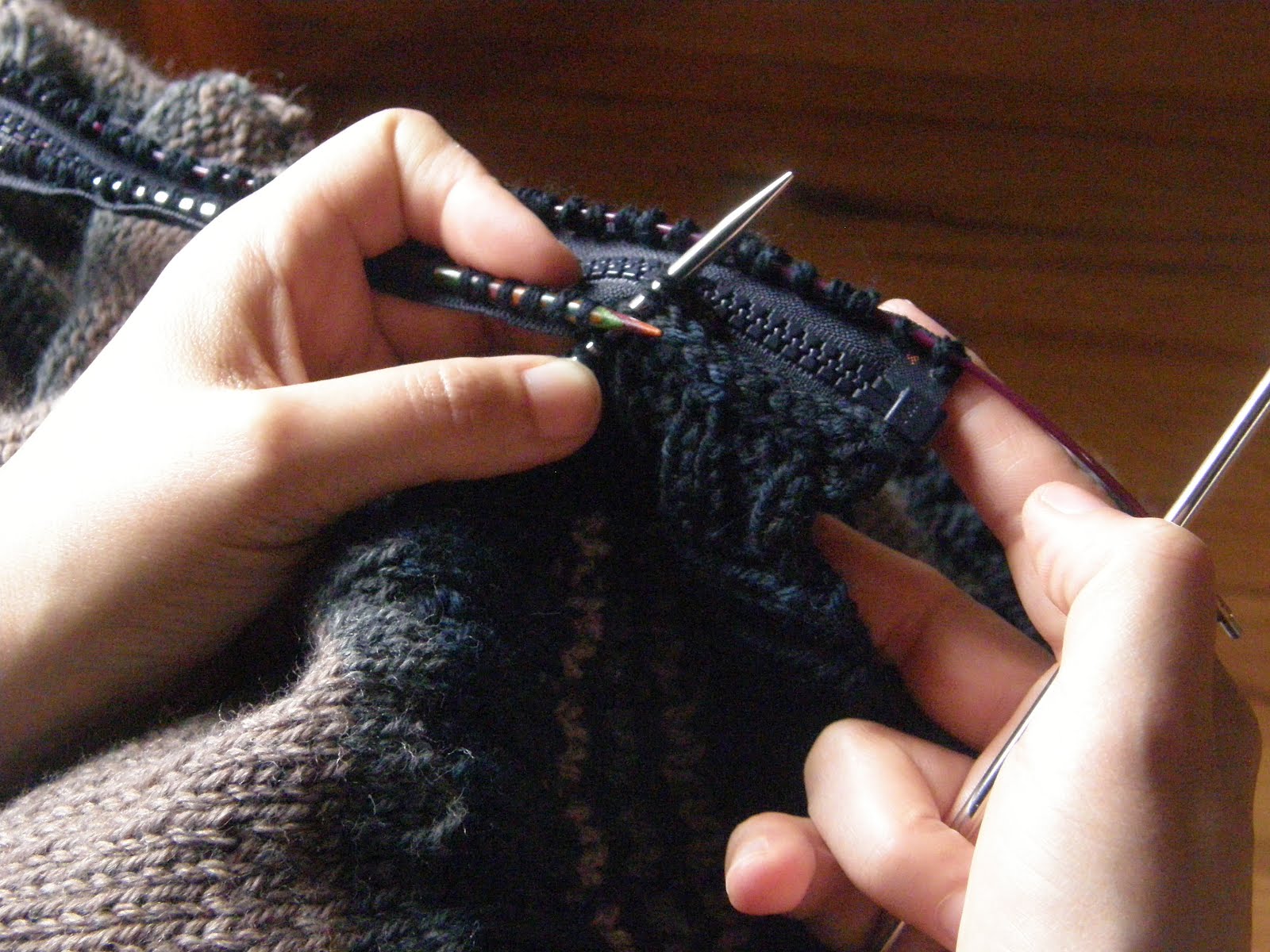 Tangled Twine: Knitting in a Zipper