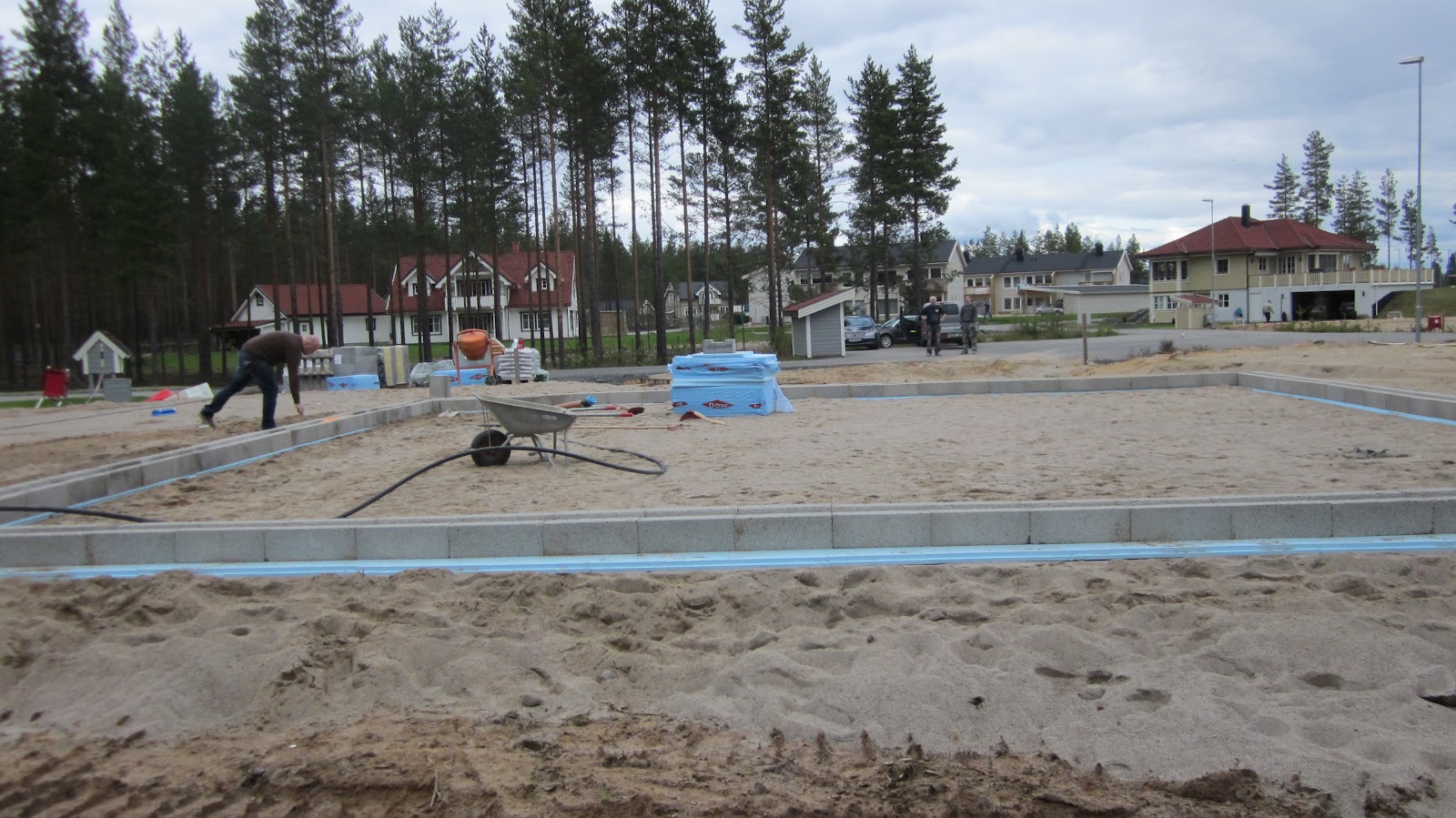 Huset vårt: Ringmur hus og garasje