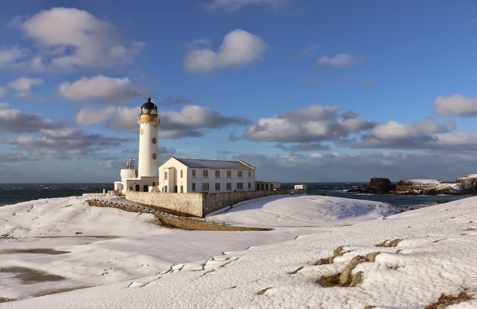 Fair Isle: February's Photos - Snow, Lighthouse, and Malcolm's Head.