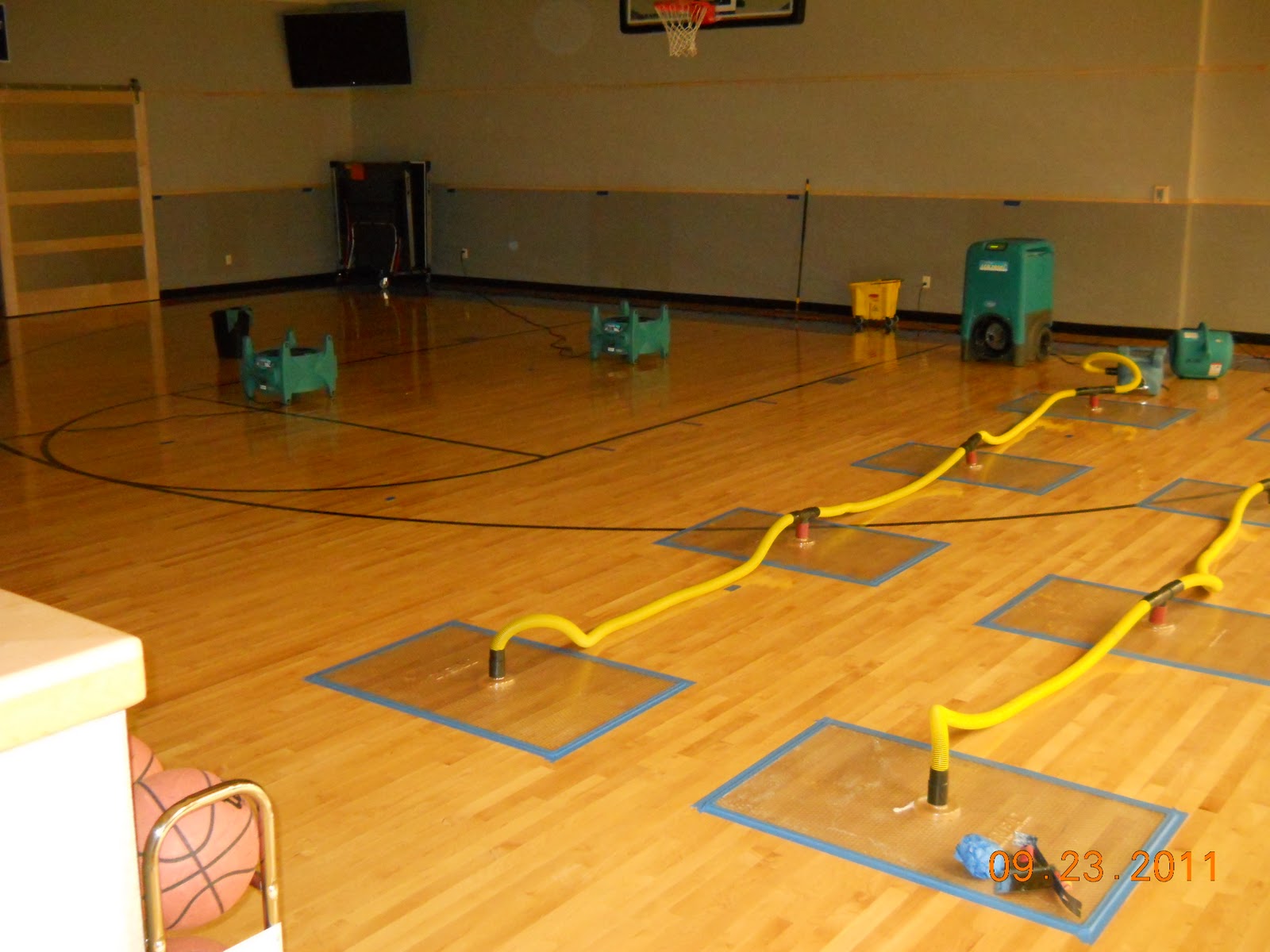 ServiceMaster of Salt Lake: Drying a flooded basket ball court.