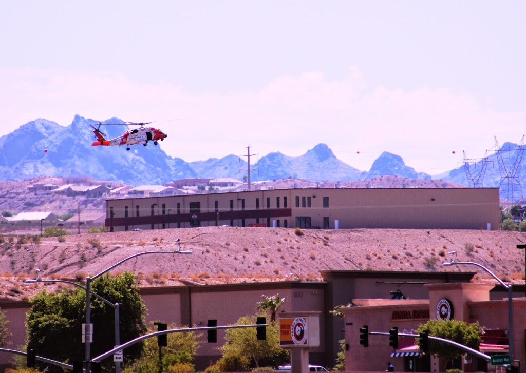 Laughlin Buzz: Coast Guard Helicopter Circles River Regatta
