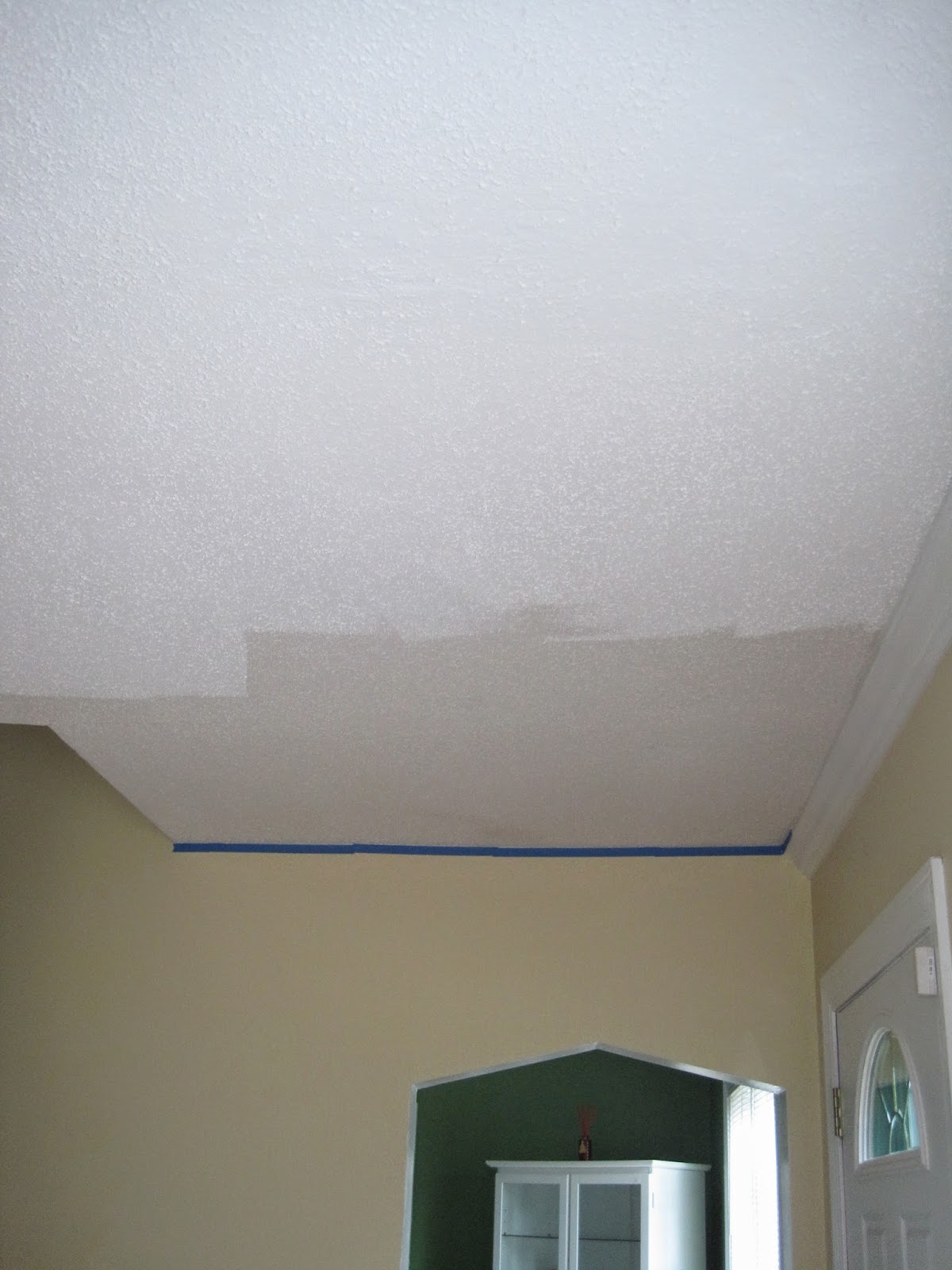 Decorated Chaos: Tips for Painting a Popcorn Ceiling