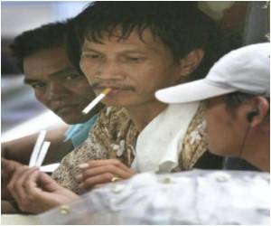 Aquino supports ban on smoking in public places