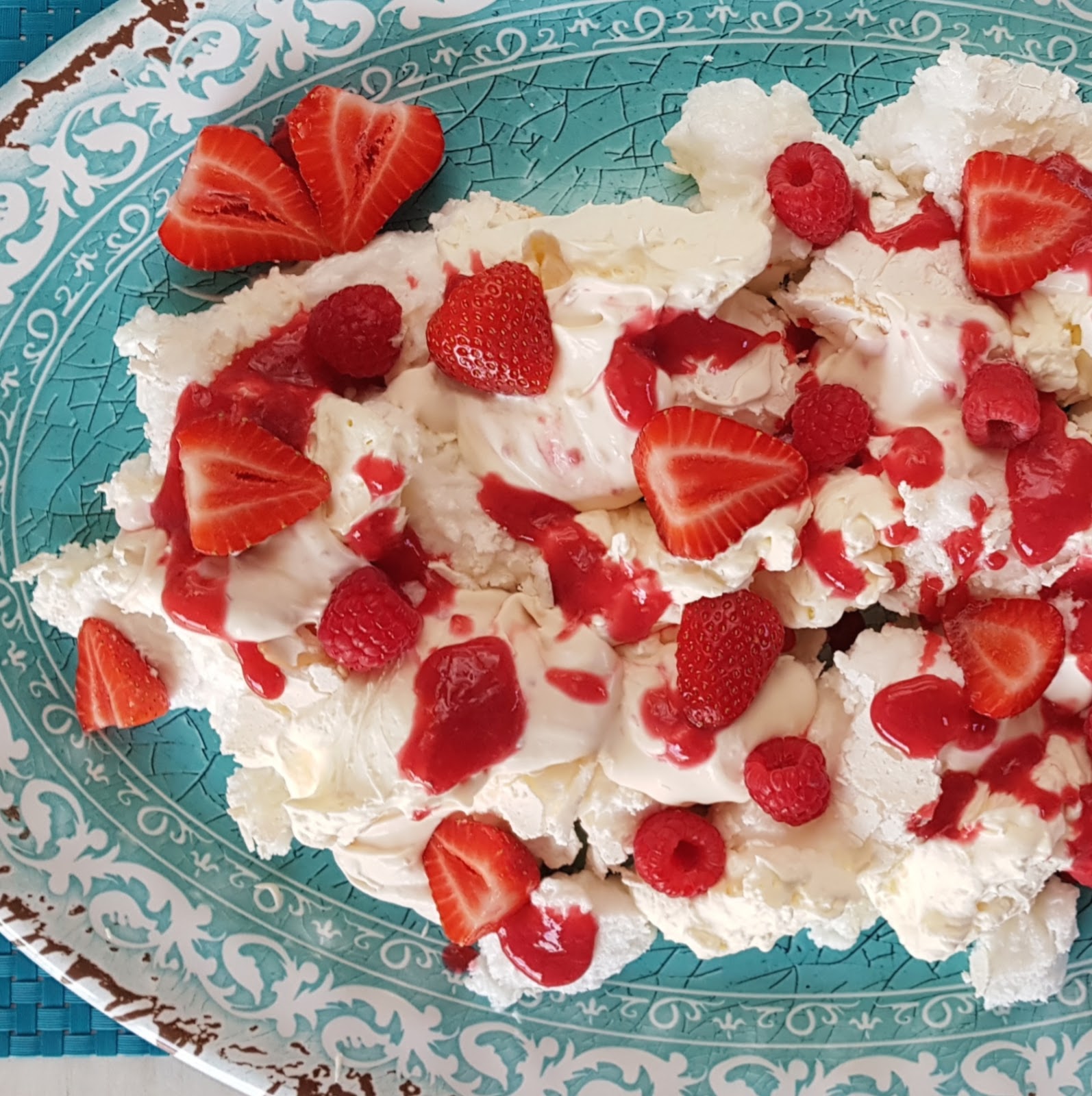 Smashed Pavlova with Raspberry Coulis Cream