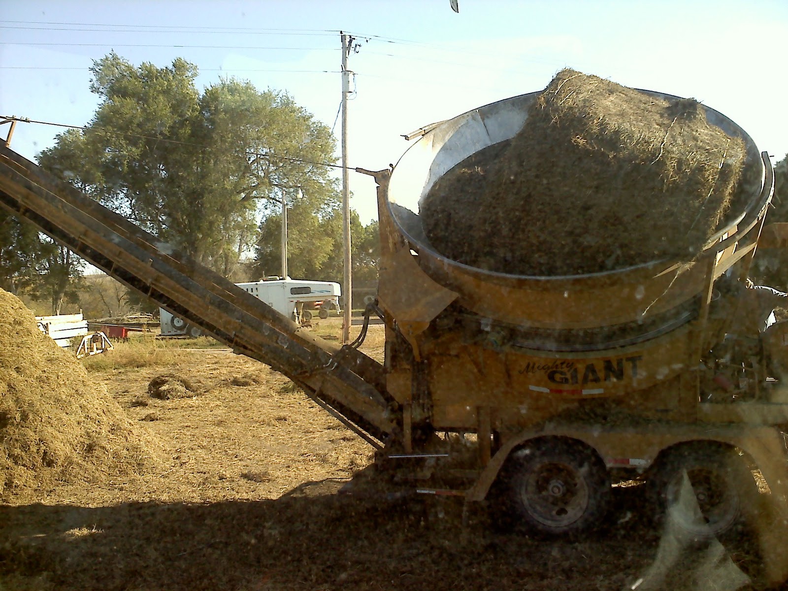 Where Corn Grows and Cattle Graze: Grinding Hay