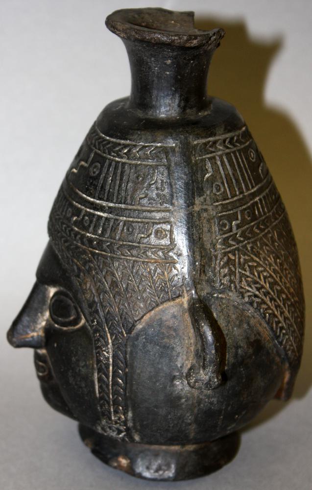 Historia del Arte: Aríbalo Incaico con Forma de Cabeza Humana