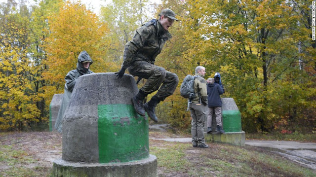 Poland's militias 'ready for anything' amid rising tensions with Russia ...