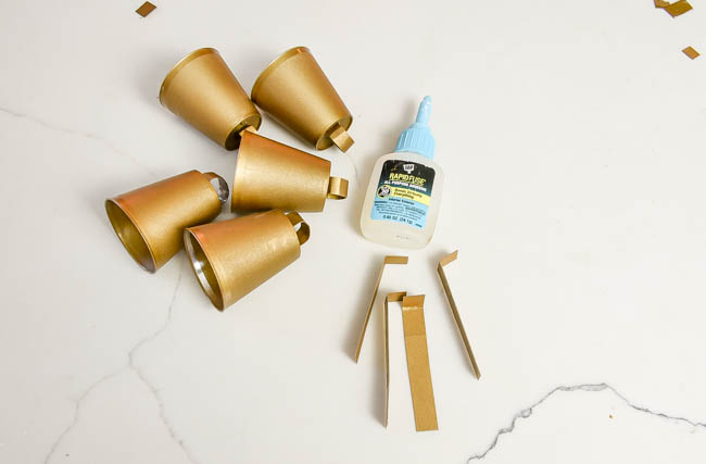 Dollar Store DIY: Vintage Inspired Brass Bells | Little House of Four ...