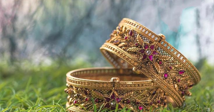 Golden broad bangles