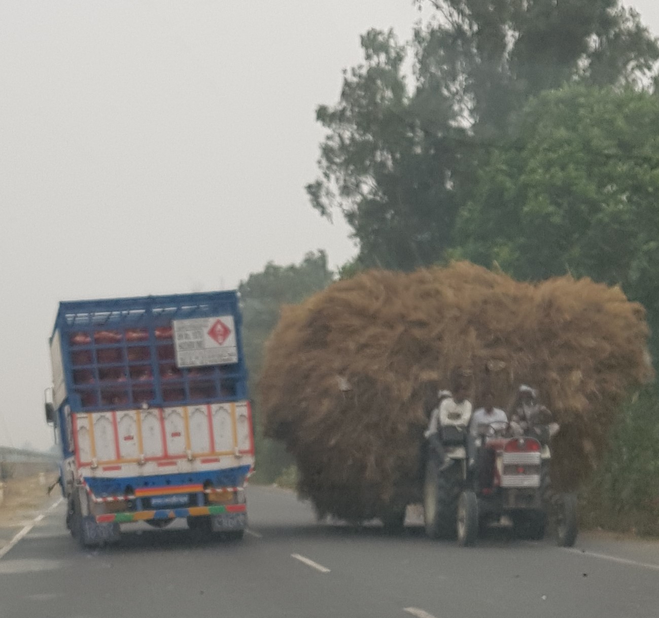 Overloaded Dry Fodder in a Tractor Trolley