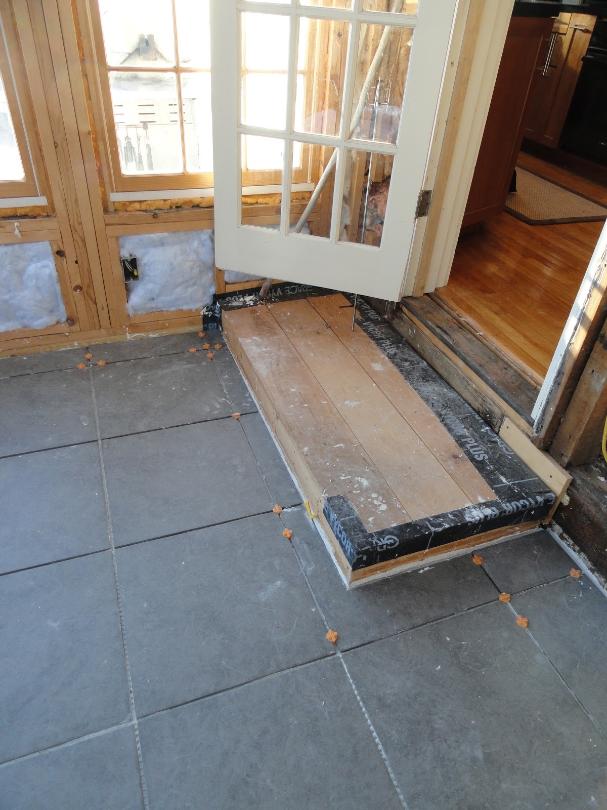 Porch Revival: Perimeter tiles installed