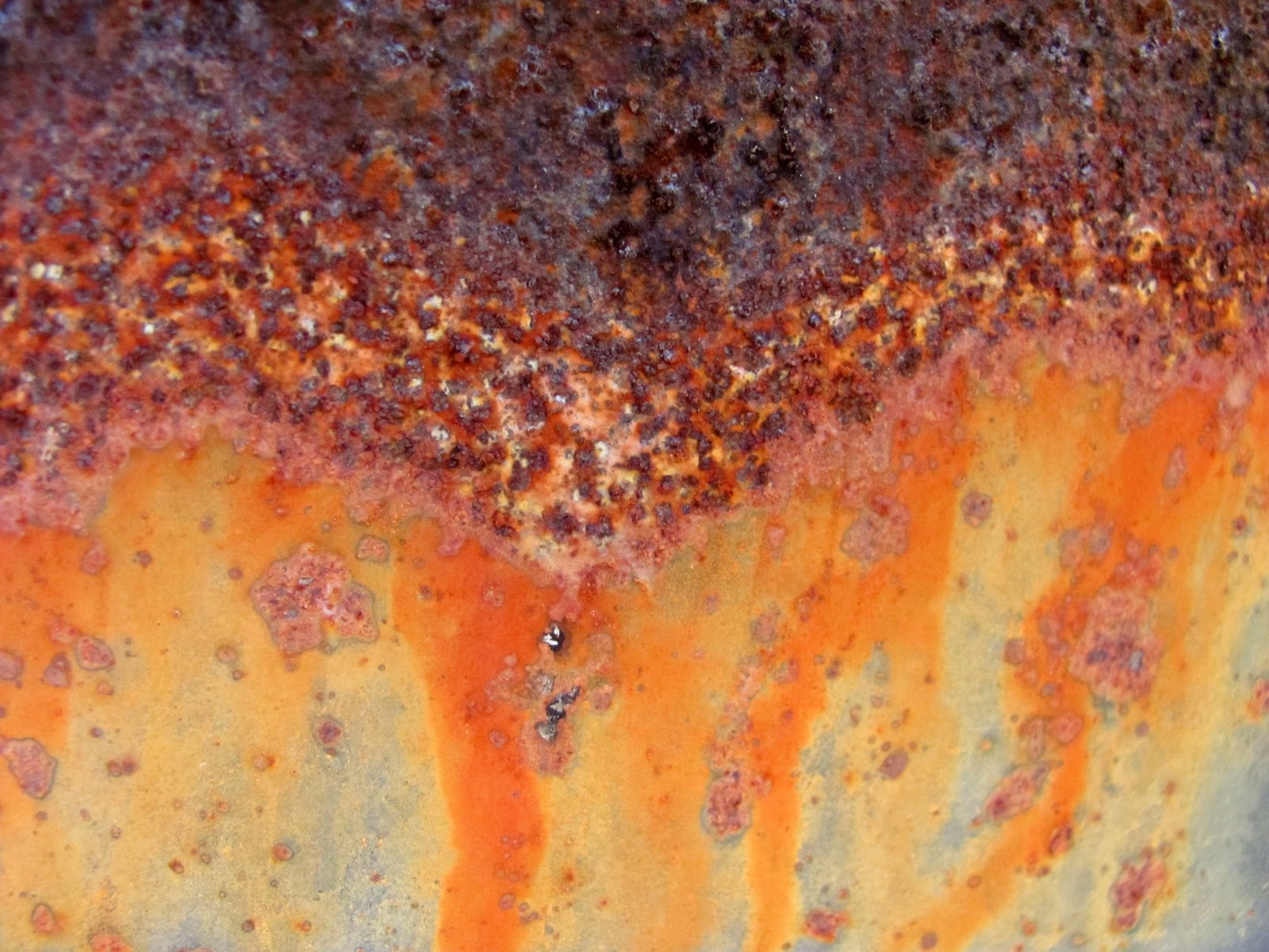 curving back: metal rust patterns