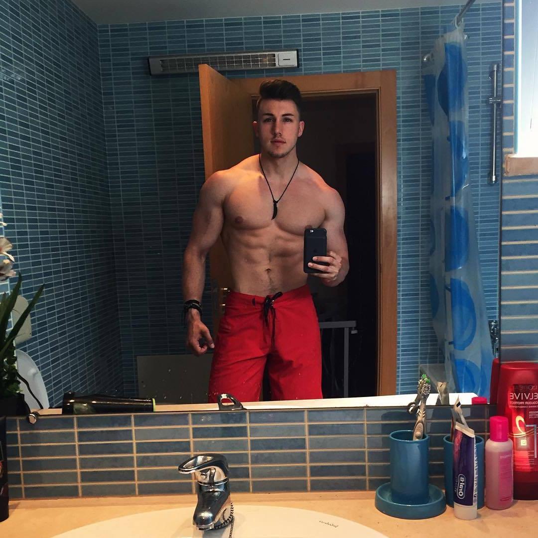 Shirtless fit men striking a pose - GAYFRIENDSCHAT.com