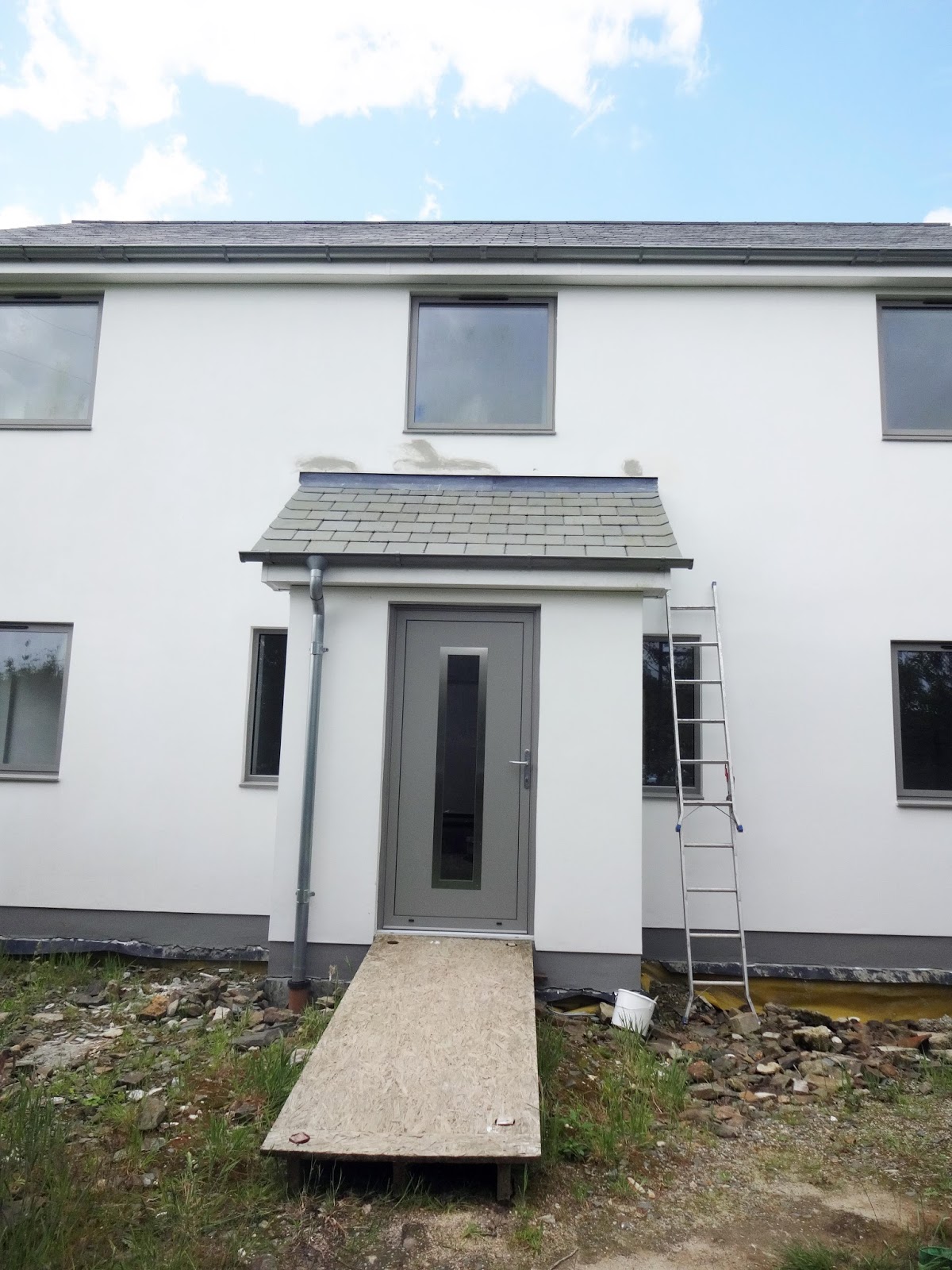 V&A's Home Build: Outside: front door step / render repairs