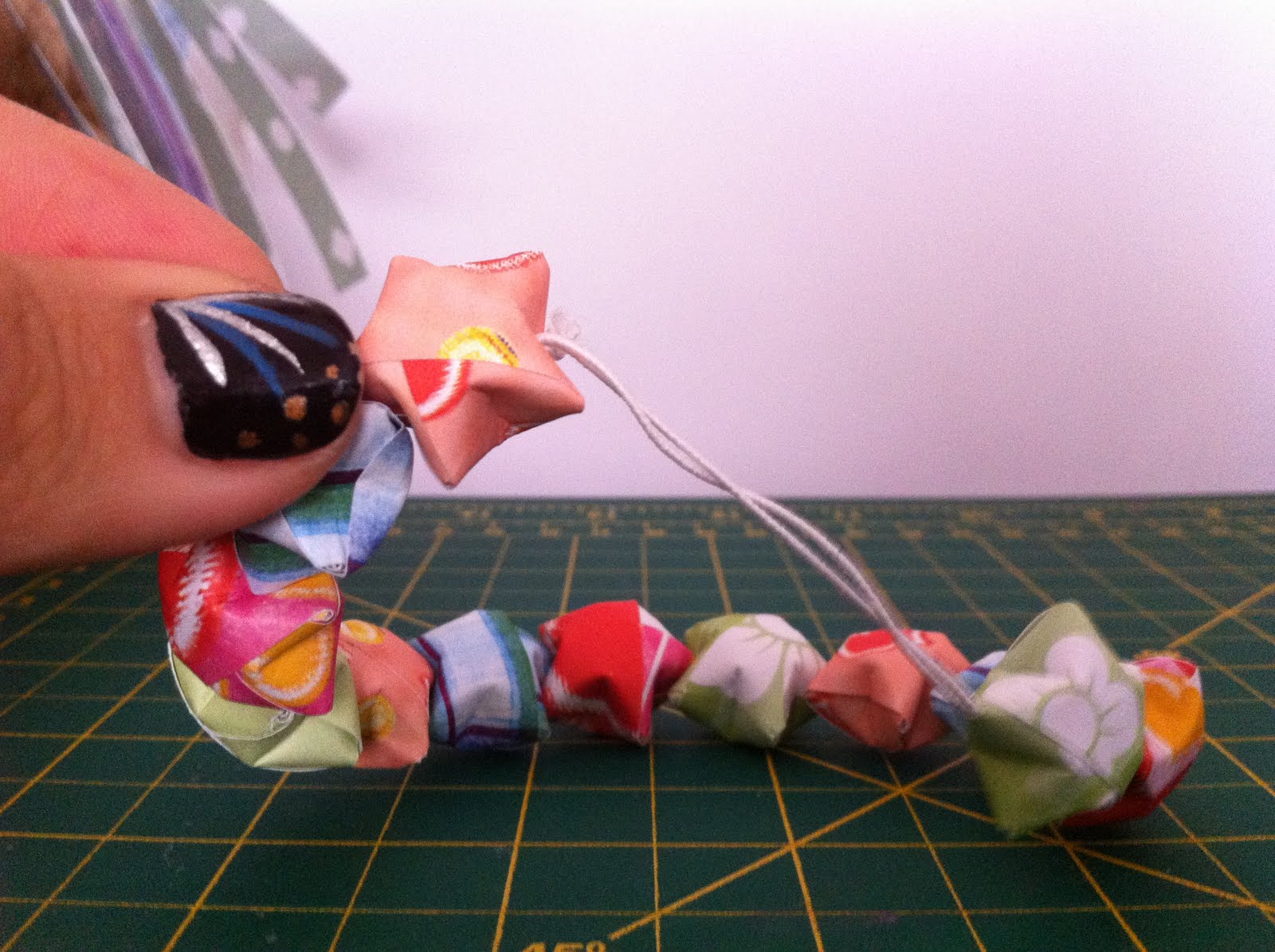 Randomly Taylor'd: Paper Star Bracelet Tutorial