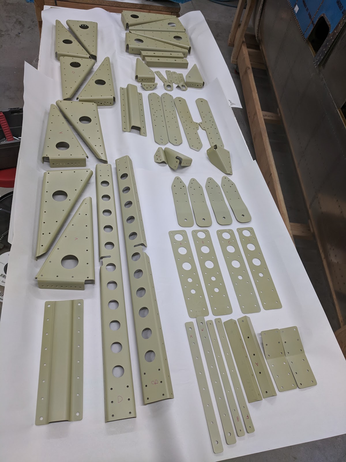 Damazio family's RV-10 project: Mid-fuselage bulkheads primer and riveting