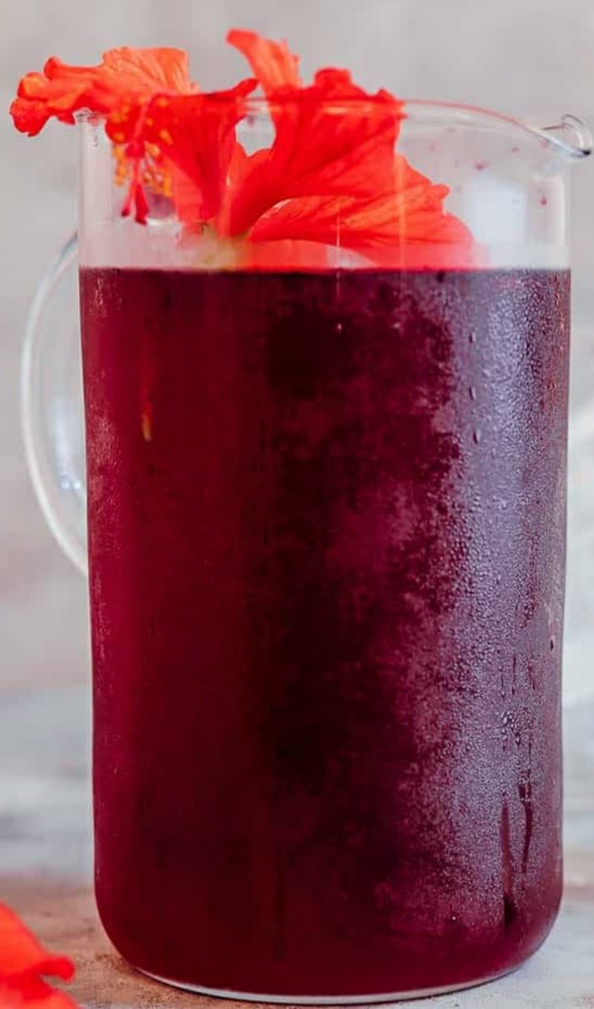 EXTRACTION OF DYE FROM HIBISCUS FLOWER AND APPLICATION OF IT ON WOOL