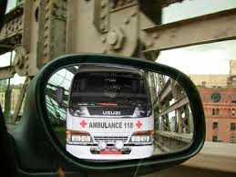 The reason why is "ambulance" spelt with mirror writing in front of an ...
