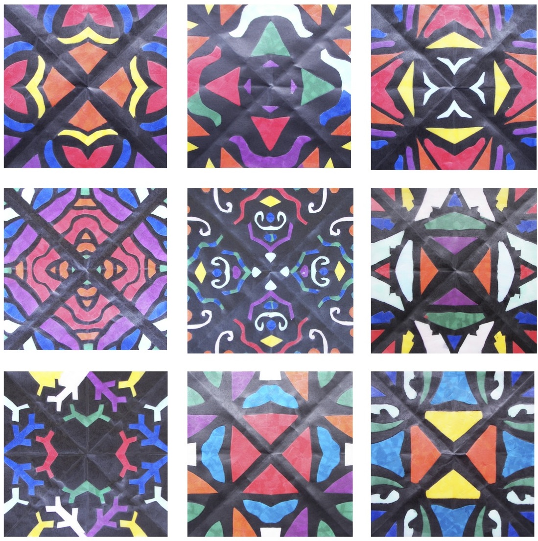 The Rolling Artroom: Cut Paper Symmetry 4th-6th Grade