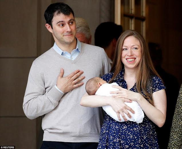 Photos: Chelsea Clinton smiles while leaving the hospital with her ...