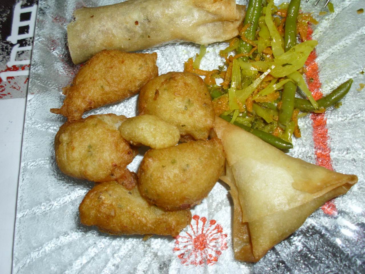 Boudins, Nem, accras de morue, samossa, achard de légumes (photos)