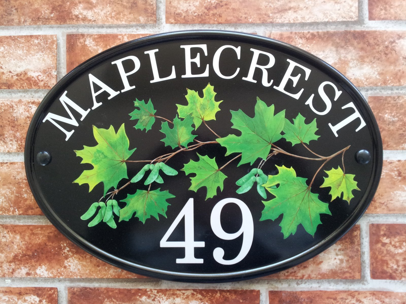 Pictorial House Signs from Yoursigns Ltd: House sign depicting maple leaves