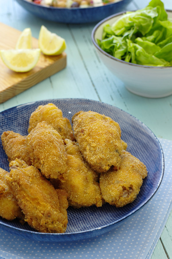 Cinco Quartos de Laranja: Asinhas de frango panadas