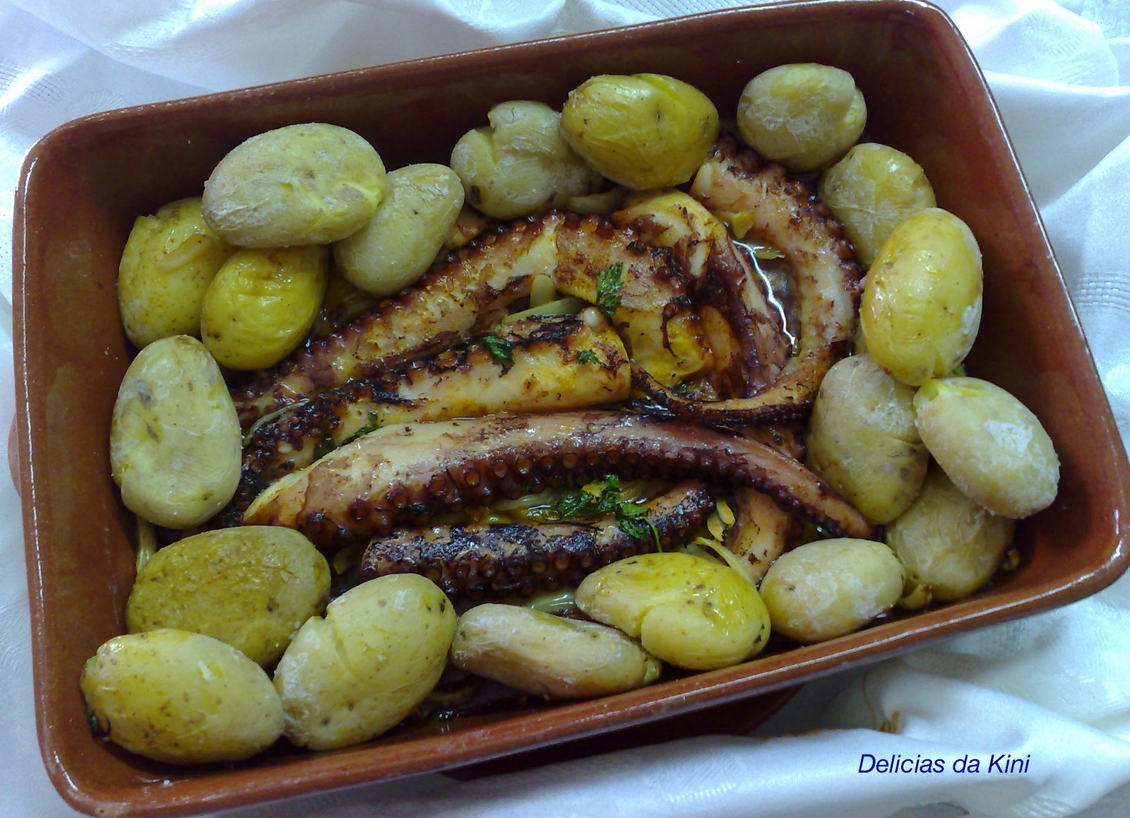 Receitas práticas de culinária: Polvo Assado com Batata a Murro