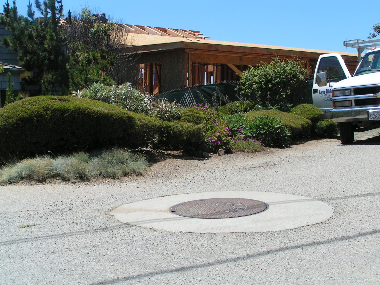 Blue Skies: Manholes to Murals - Ellie Bogardus Wall Landscape Cover
