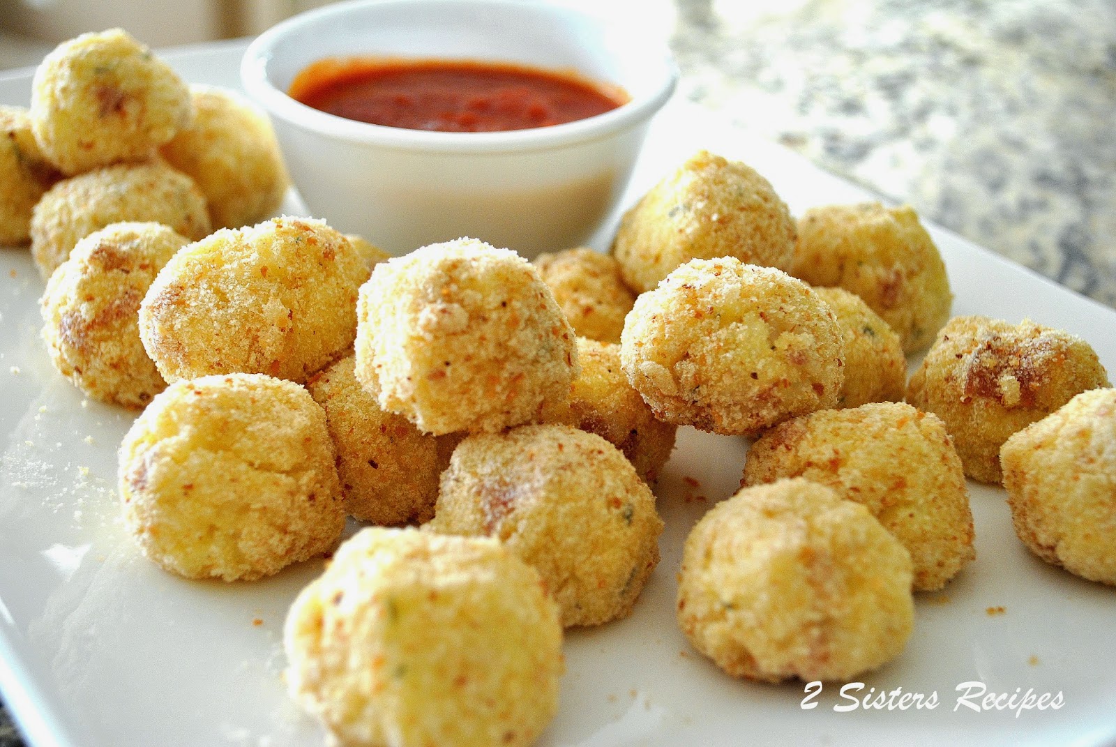 Baked Mini Rice Balls Stuffed with Soppressata - 2 Sisters Recipes by ...