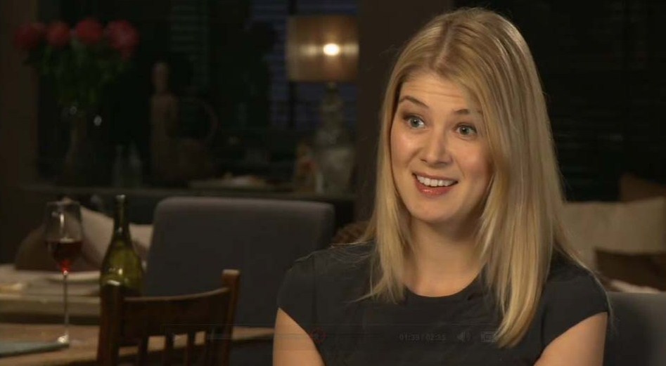 Watch a 'Johnny English Reborn' featurette and a new still of Rosamund Pike