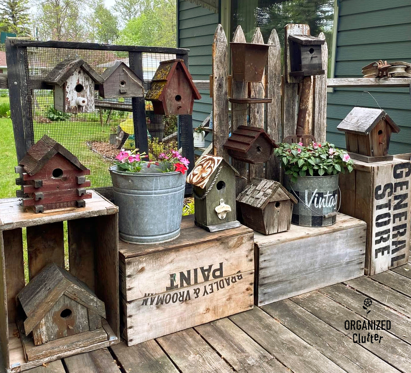 Rustic Birdhouse Display Assembled From Crates, Fence Picket, and a ...