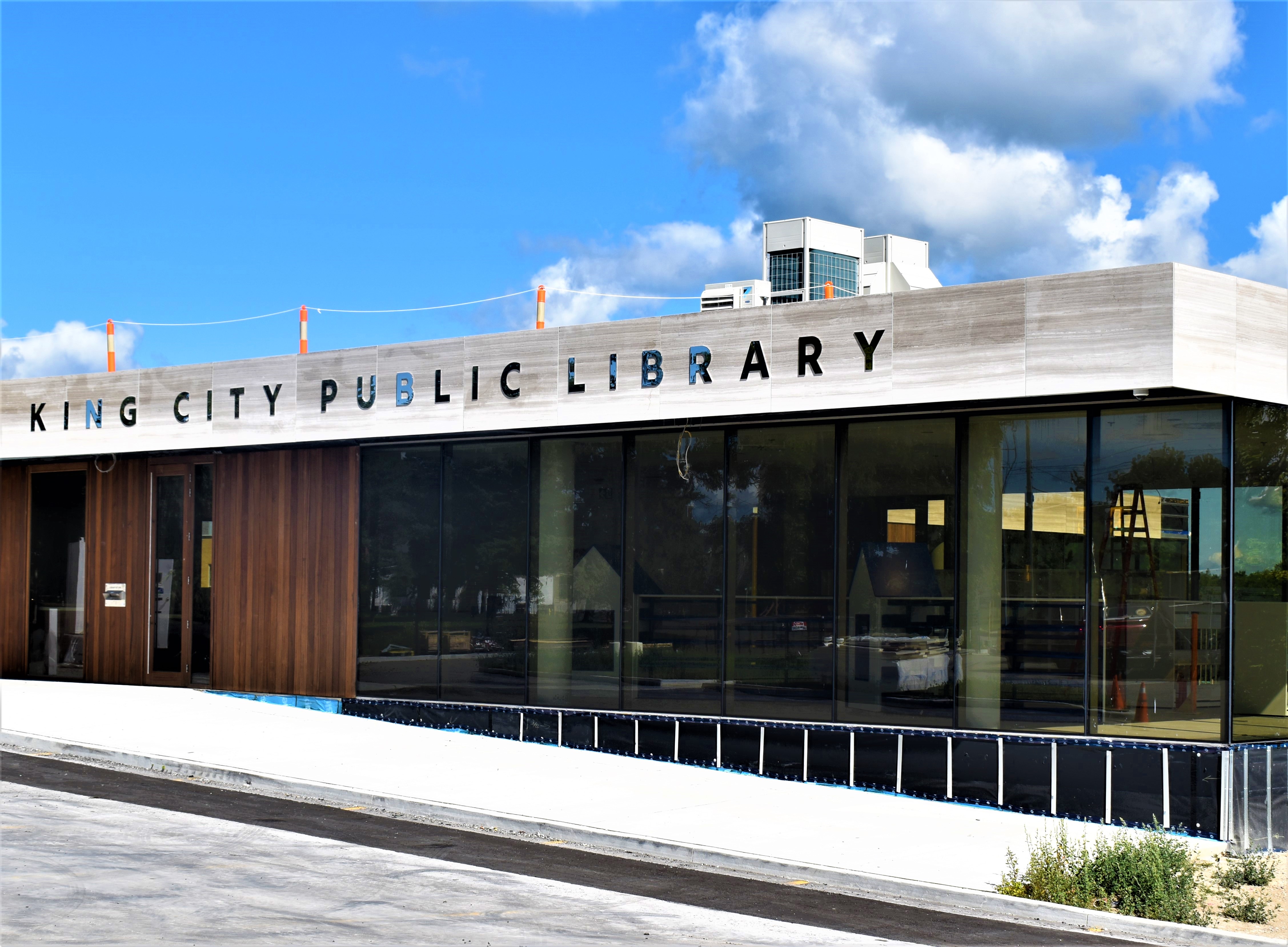 Camera on King & Aurora : New Library & Seniors Centre get signs...