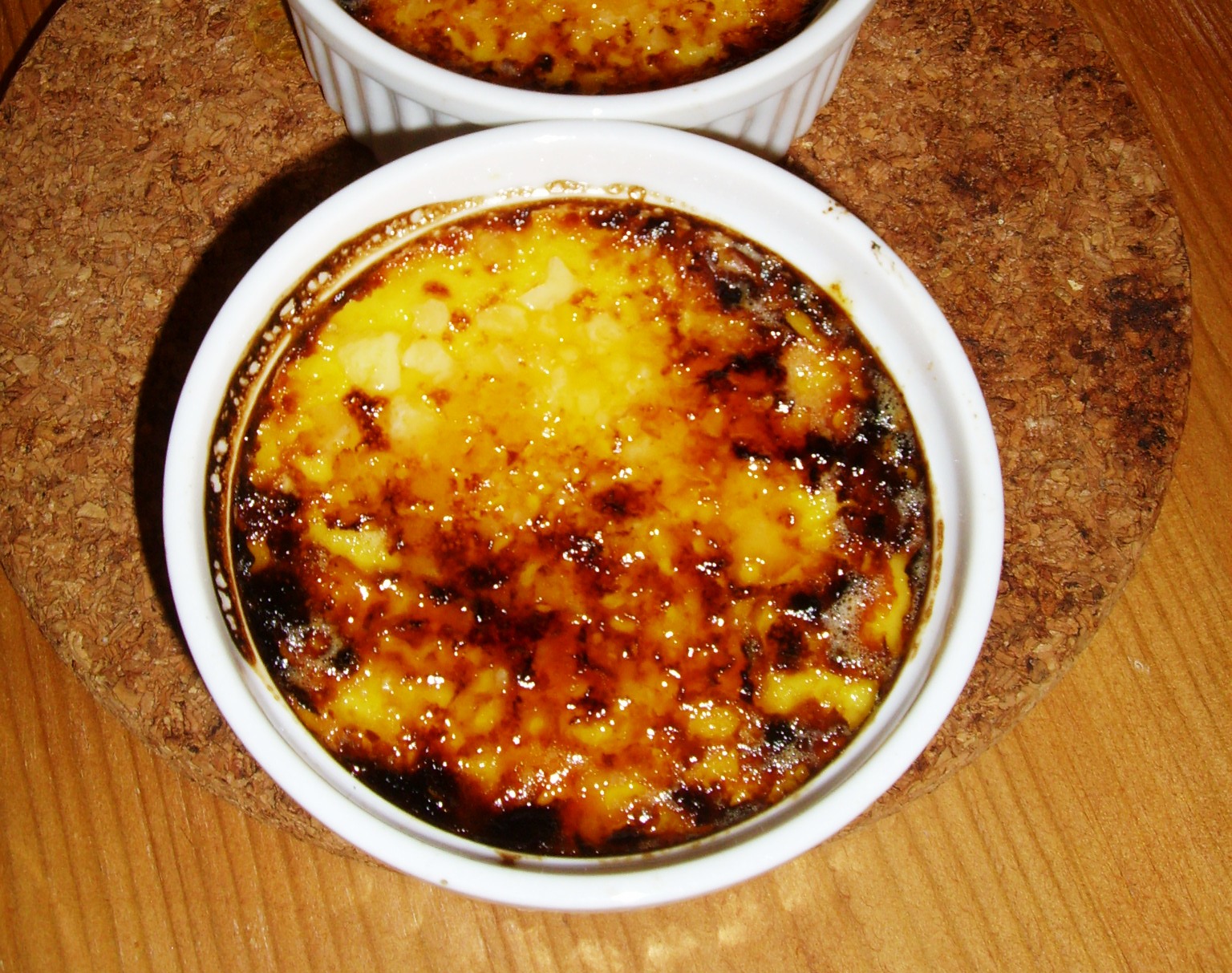 Crème brûlée with homemade vanilla sugar and meringues