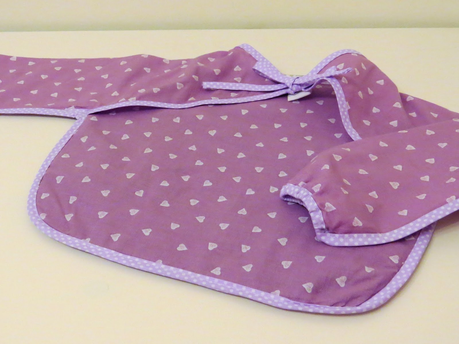 pink red poppies -es: Pitets liles amb mànigues