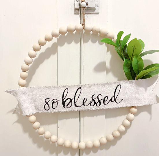 Beaded Wreath with Painted Banner