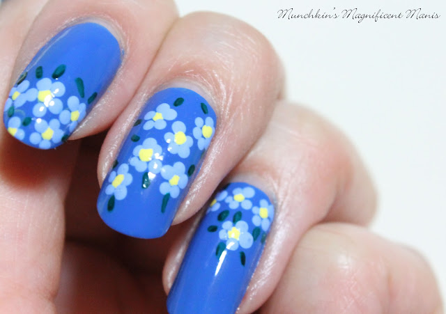 Munchkin’s Magnificent Manis: Spring Time- Blue Flowers Nail Design