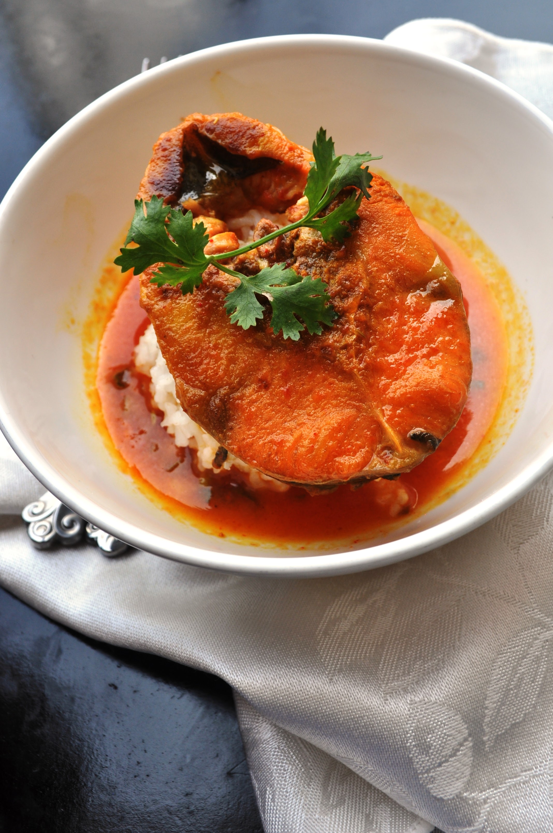 Fish in Tangy Tomato Gravy (Masor Bilahi Tenga)