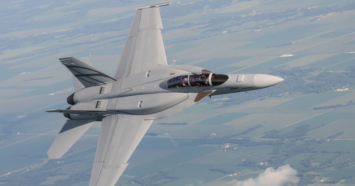 SNAFU!: F-18 w/conformal fuel tanks via Amy Butler & Aviation Week.