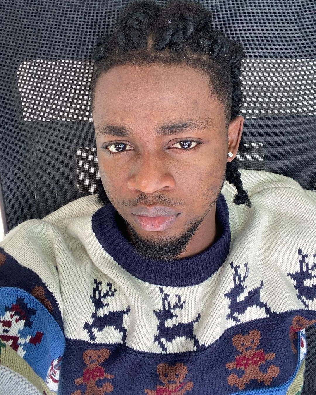 Pictures of Omah Lay Hair Style