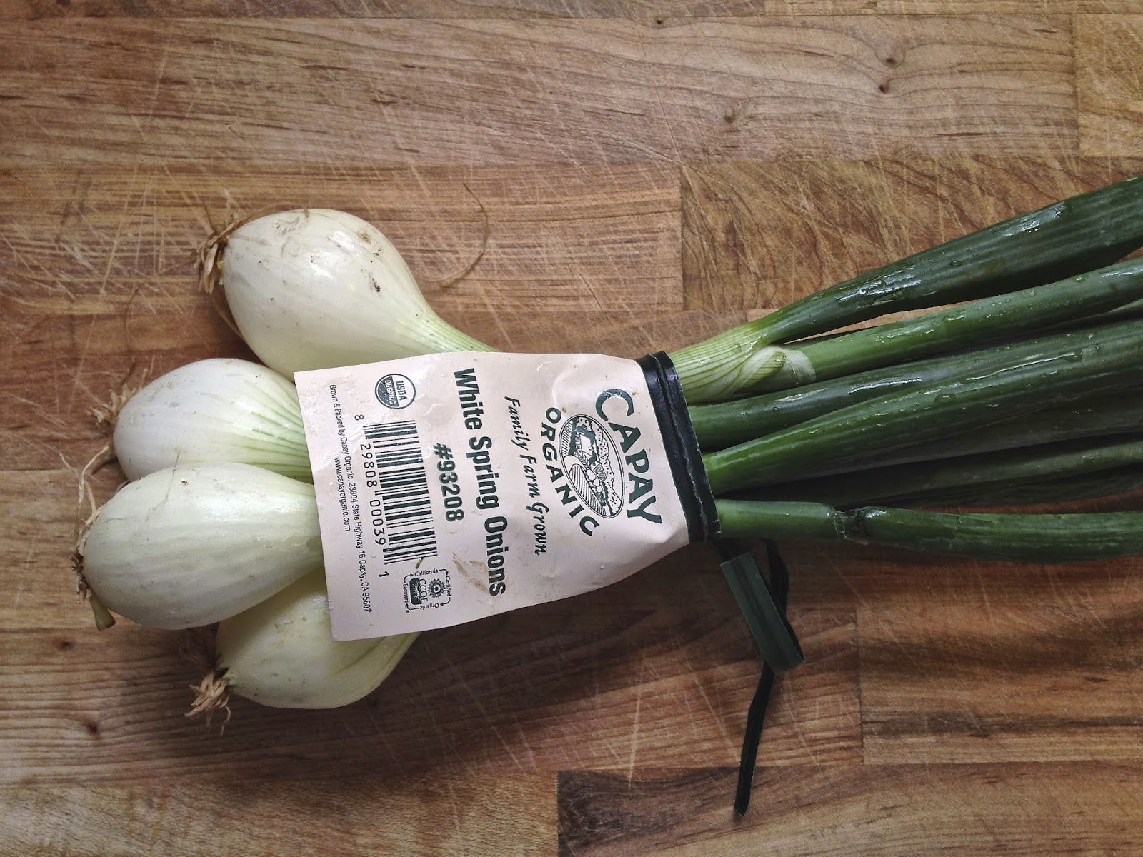 salt & zest: Baked Eggs with Spring Onion and Spinach
