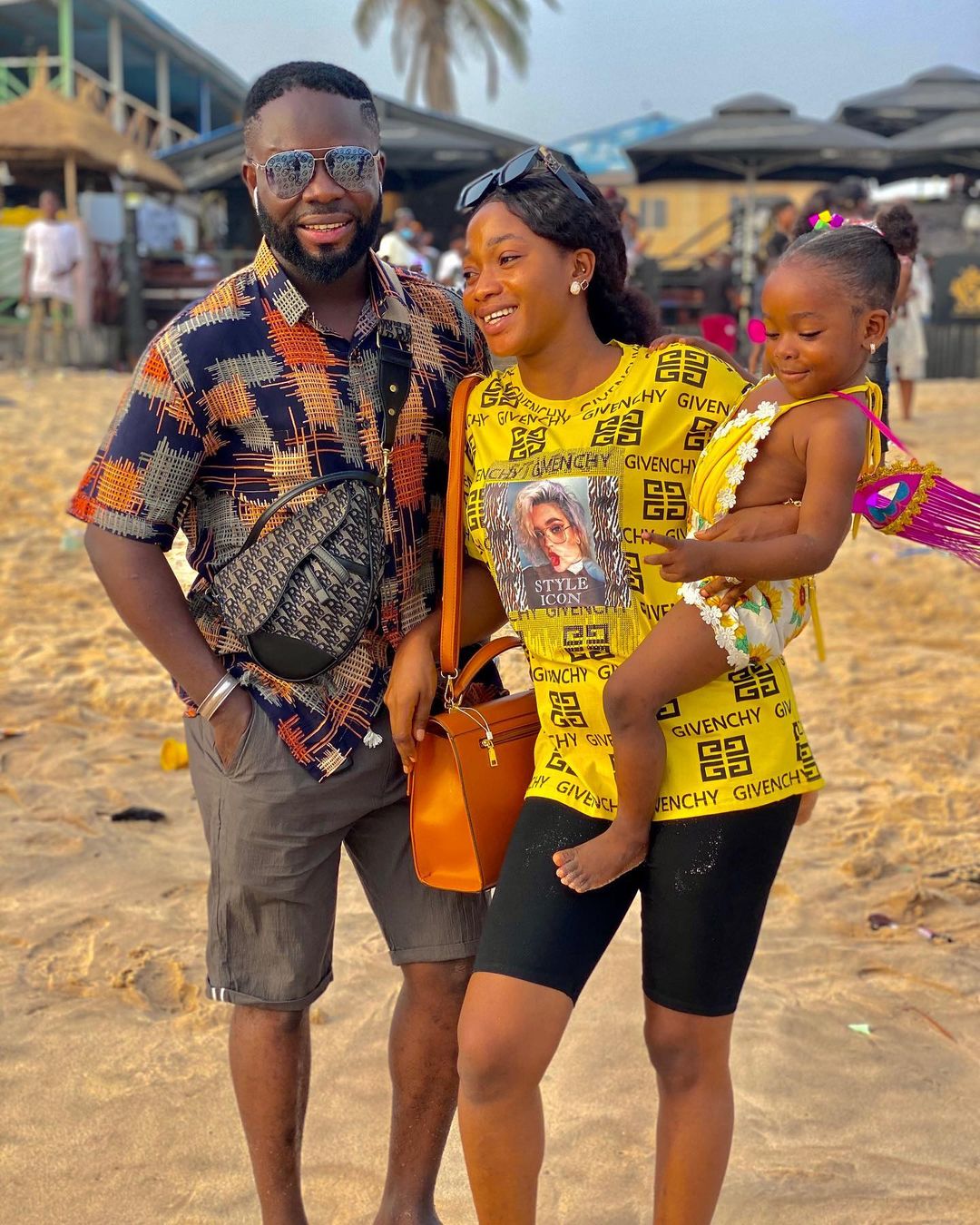 Family picture of Ibrahim Yekini Itele D Icon and his wife and daughter