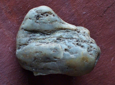 Archaeology of Portable Rock Art: Another sleeping duck figure stone ...