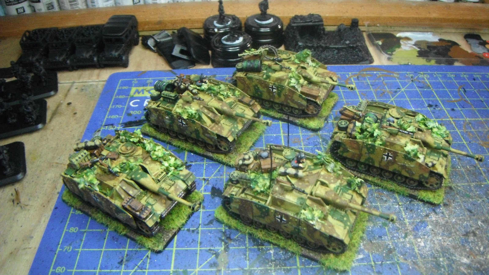 A figure painting therapy project.: Normandy themed StuG G platoon.