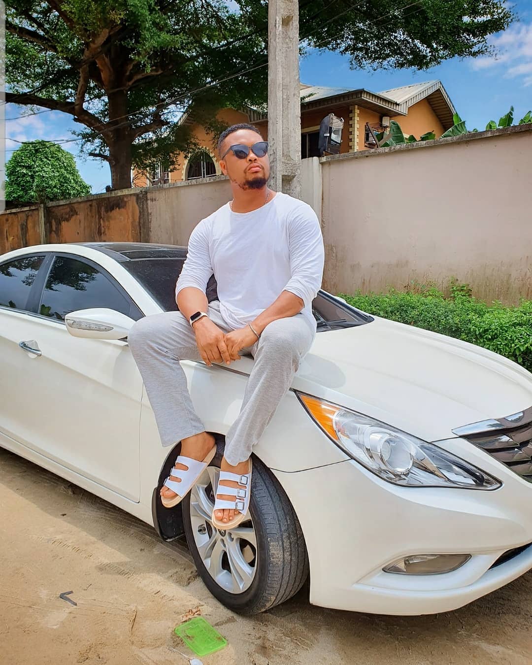Photos as Nollywood actor, Bryan Emmanuel poses with his car