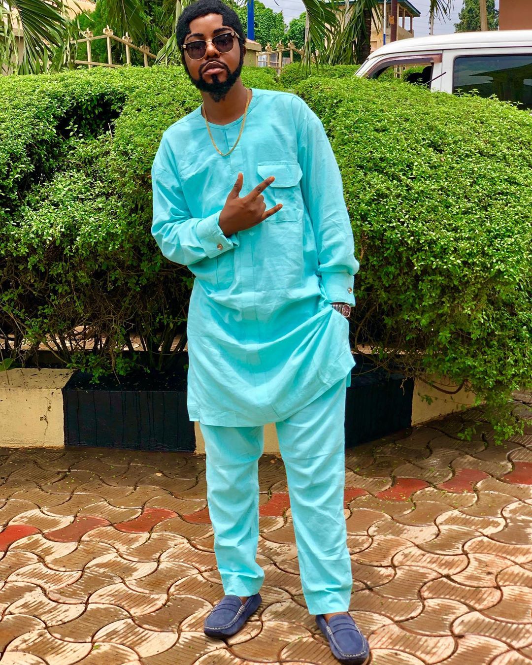 Jennifer Paul dressed and made up as a man wit beard on the set of 'Wishes'