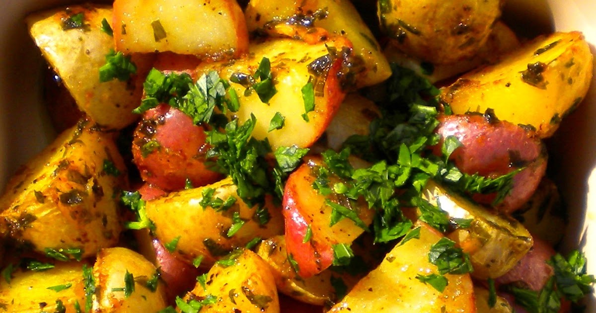 Roasted potato coins with oil and herbs