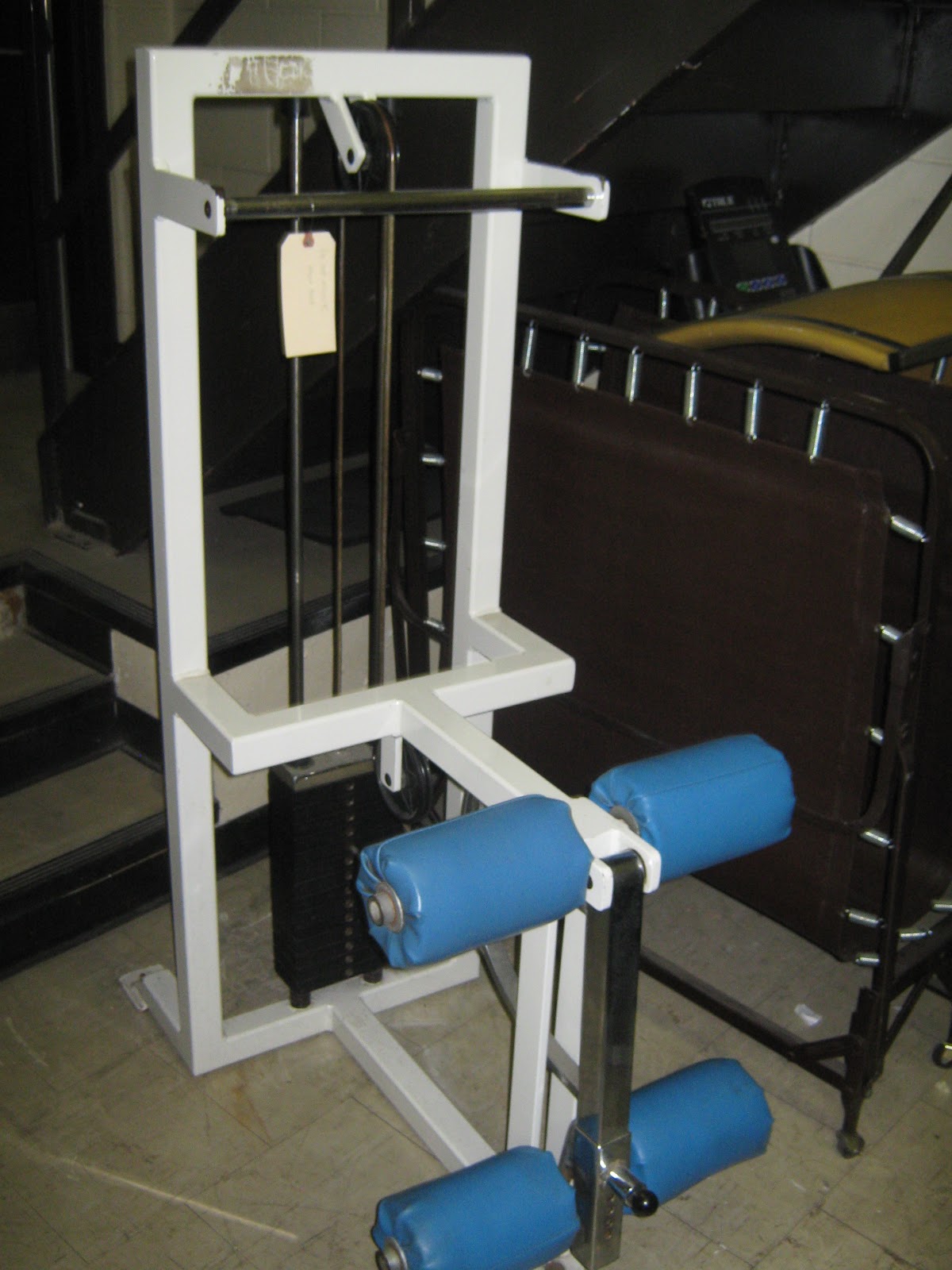 Fitness Committee: Standing leg curl machine