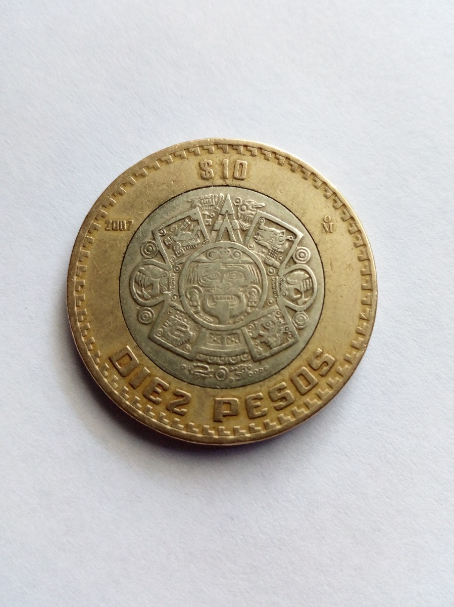 Moneda de $10 pesos con la grafila invertida