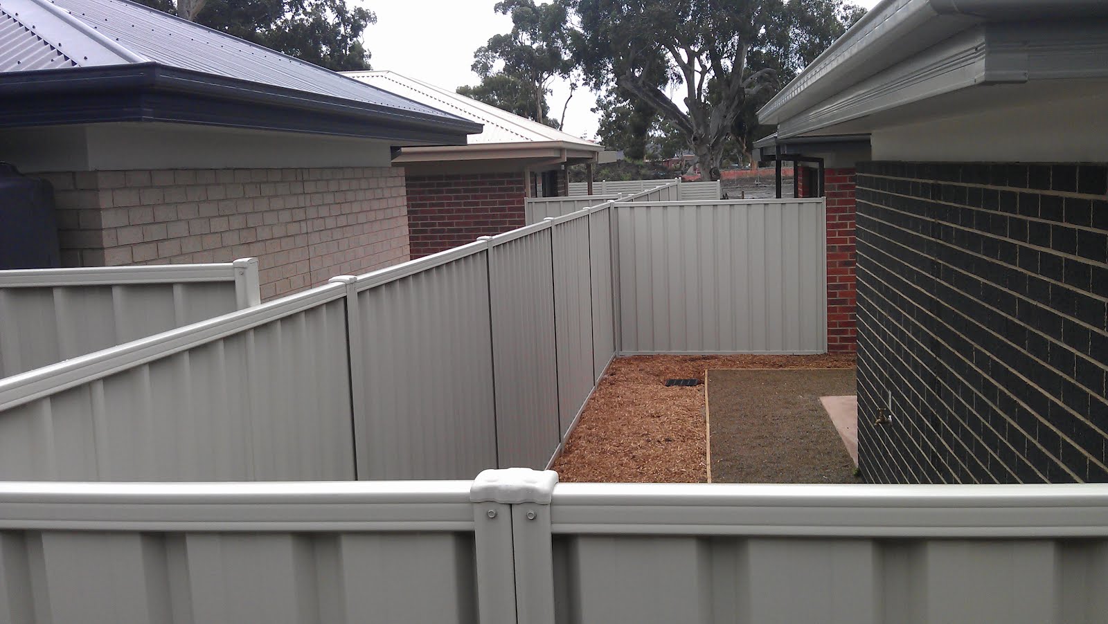 Ironman Fencing: Metroll Trimfence® Colourbond Fencing